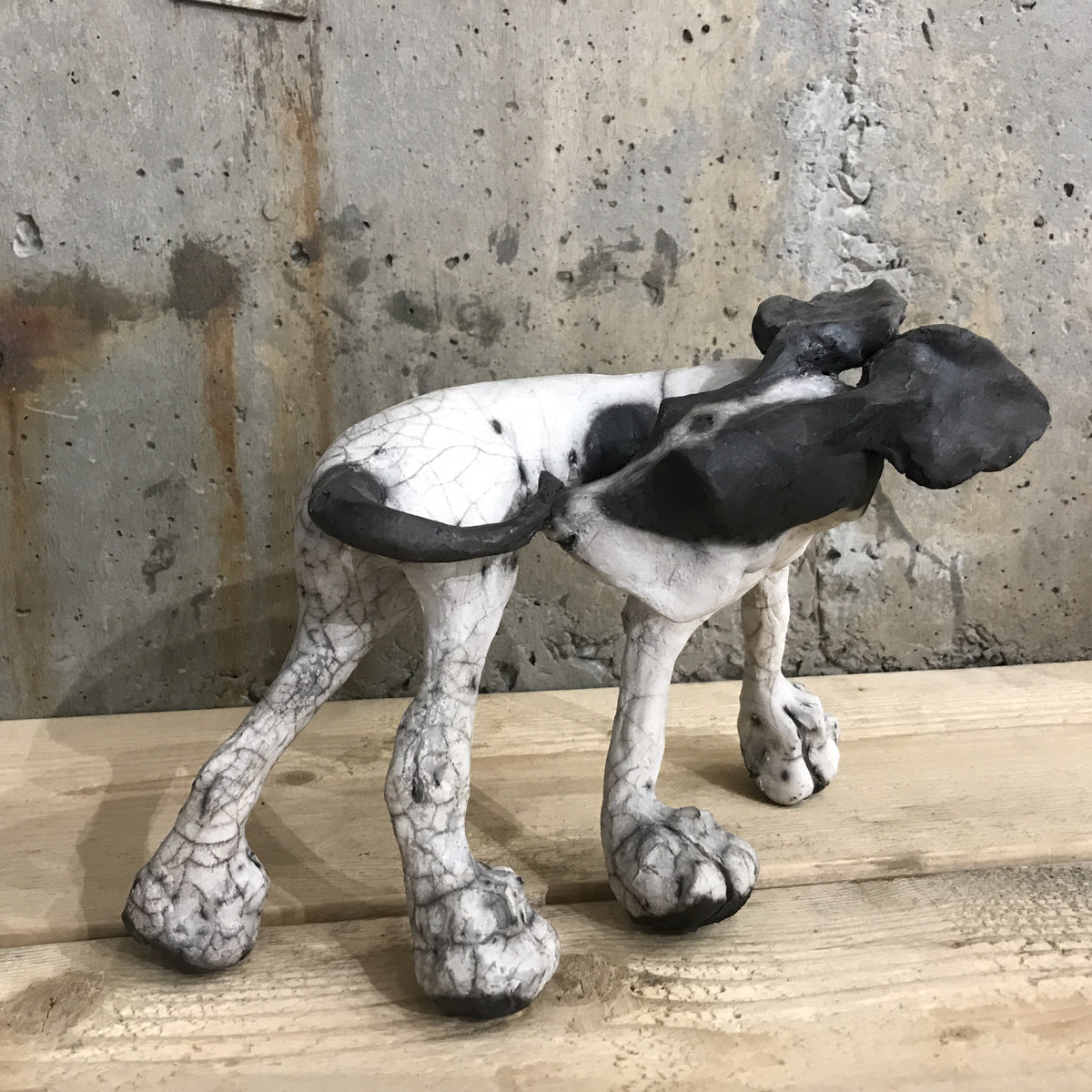 Tail Chasing Dog Sculpture – Gower Gallery